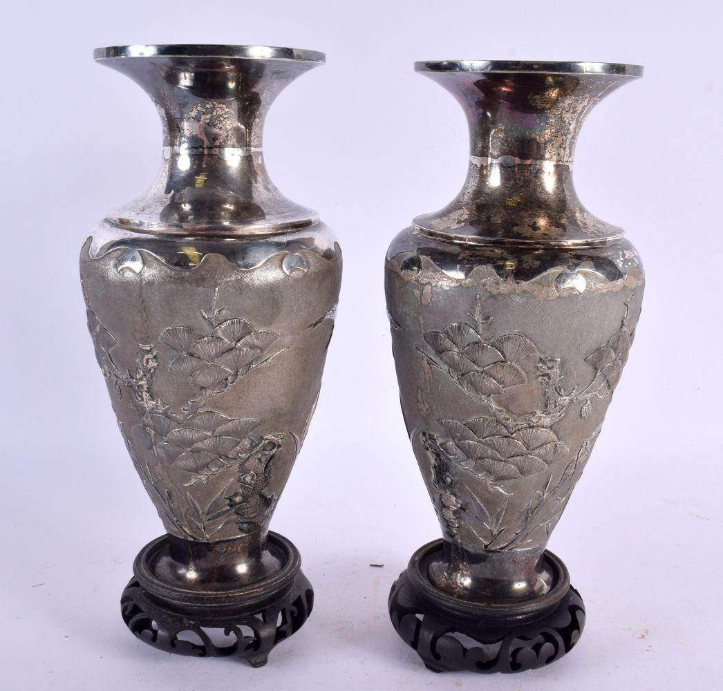 A Pair Of 19th Century Chinese Export Silver Vases Decorated In Relief ...