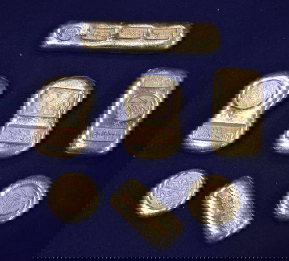 A Collection Of Chinese Yellow Metal Ingot Paperweights. Largest 9.5 X ...