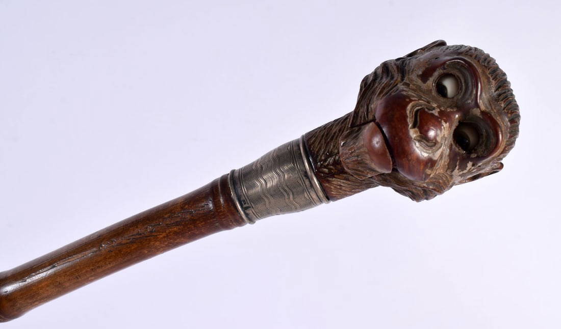 A Rare Antique Silver Mounted Articulated Treen Monkey Head Walking ...