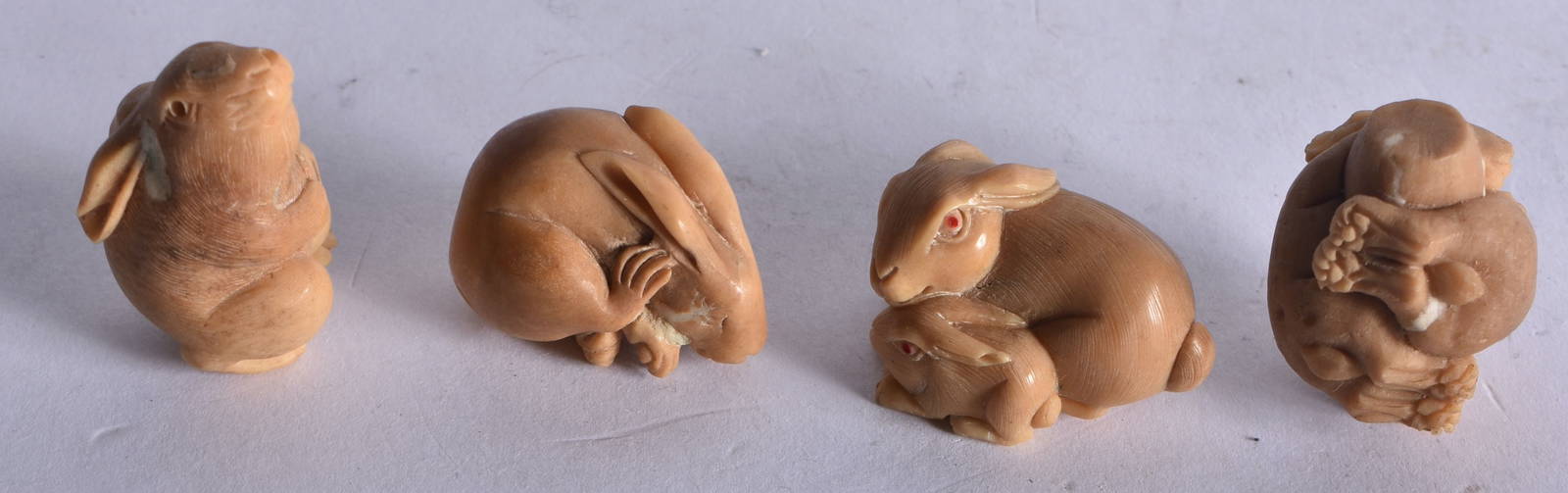 Four Nut Netsukes Carved As Rabbits In Various Poses. Largest 3.2 Cm X ...