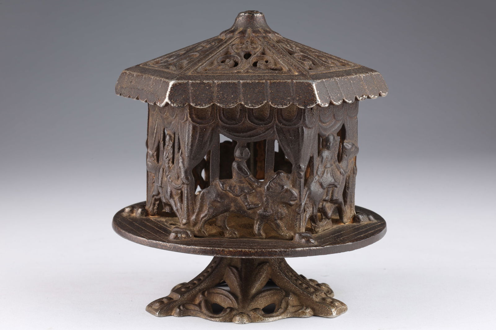 Antique Cast Iron Revolving Carousel Bank Auction