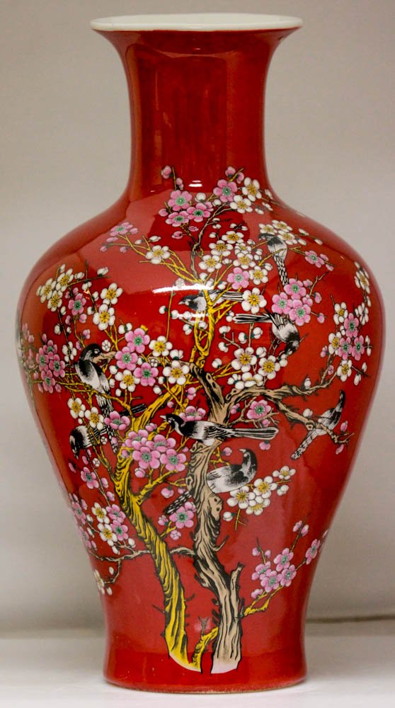 Beautiful red porcelain vase w/ detail flowers & birds