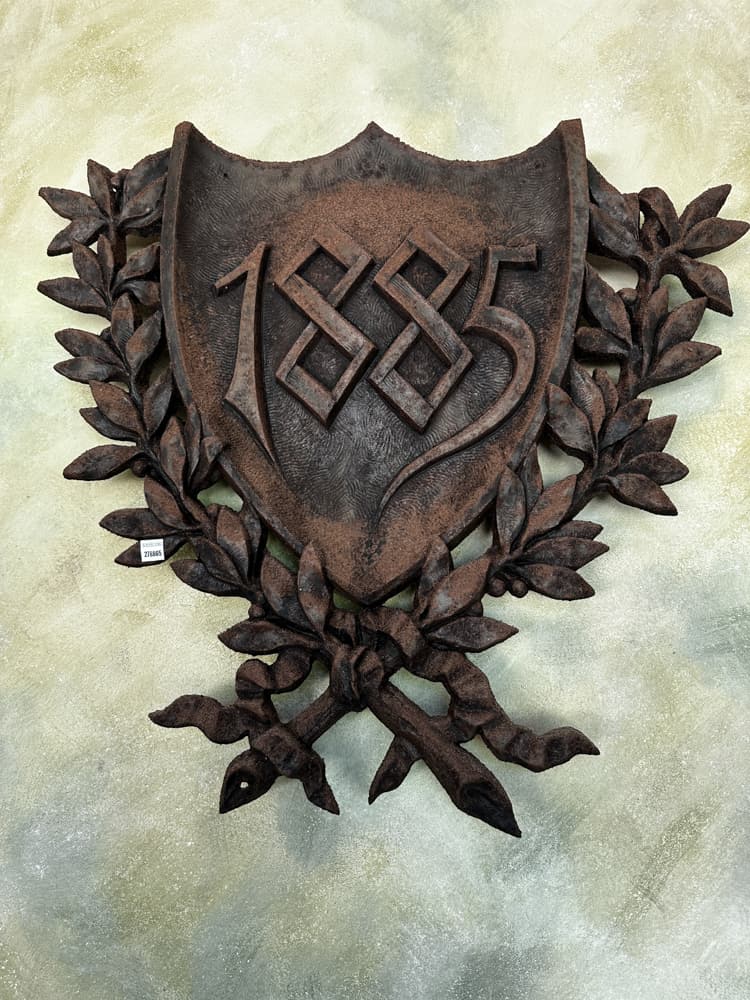 1885 Cast Iron Shield Auction