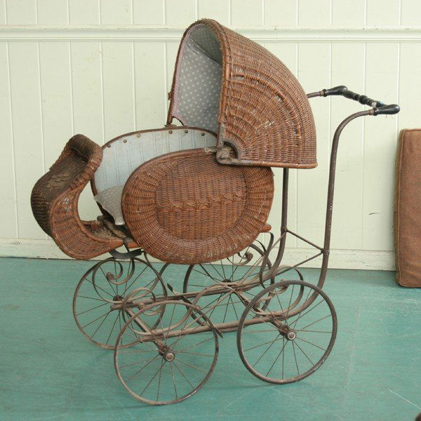 287: Circa 1900 wicker baby stroller, signed Heywood