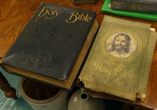 1306: Two large old family Bibles, (1) A.J. Holman Co.,
