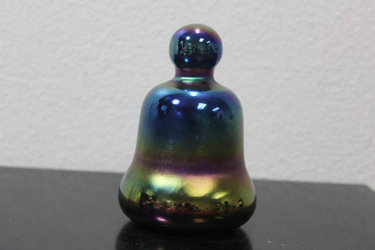 An Iridescent Gibson Paperweight