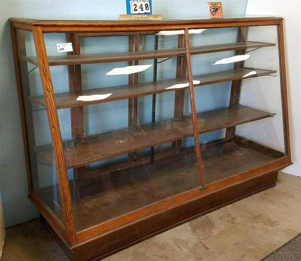 C.1900 Columbus Slant Front Oak Showcase, 49.5"w X 6'w