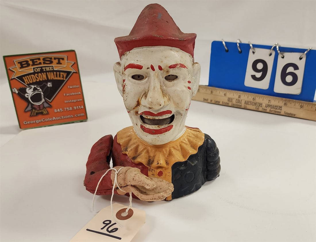 Mechanical Cast Iron Clown Bank Auction