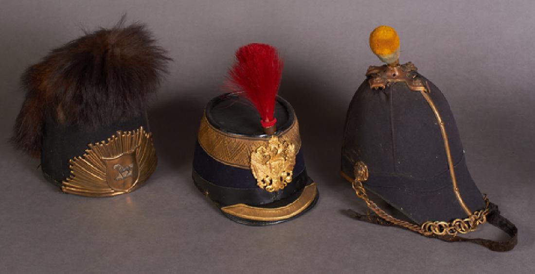 Three Vintage Helmets, c. 1900, consisting of an