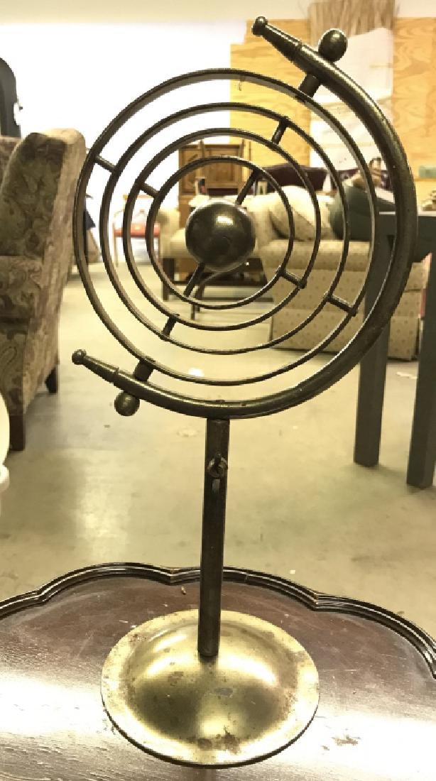 Pedestaled Rotating Metal Sculpture