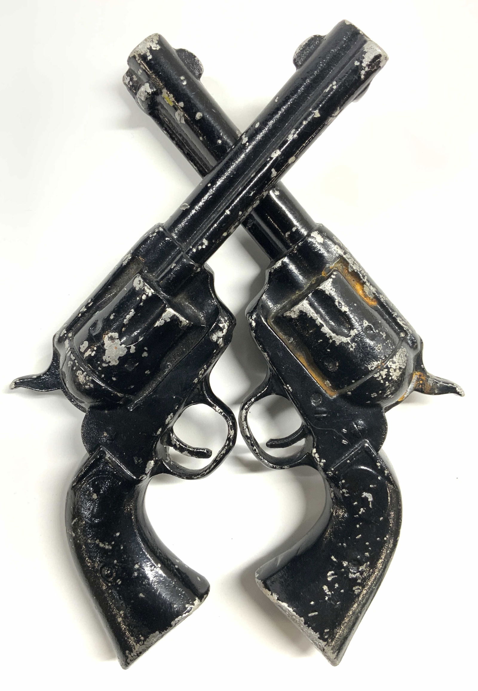 Pair Black Iron Revolver Figures