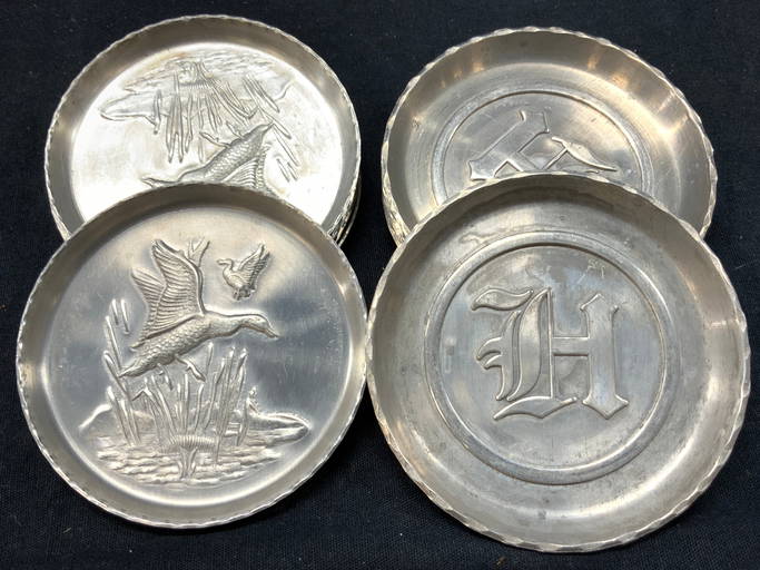 11 Pewter Repousse Coasters