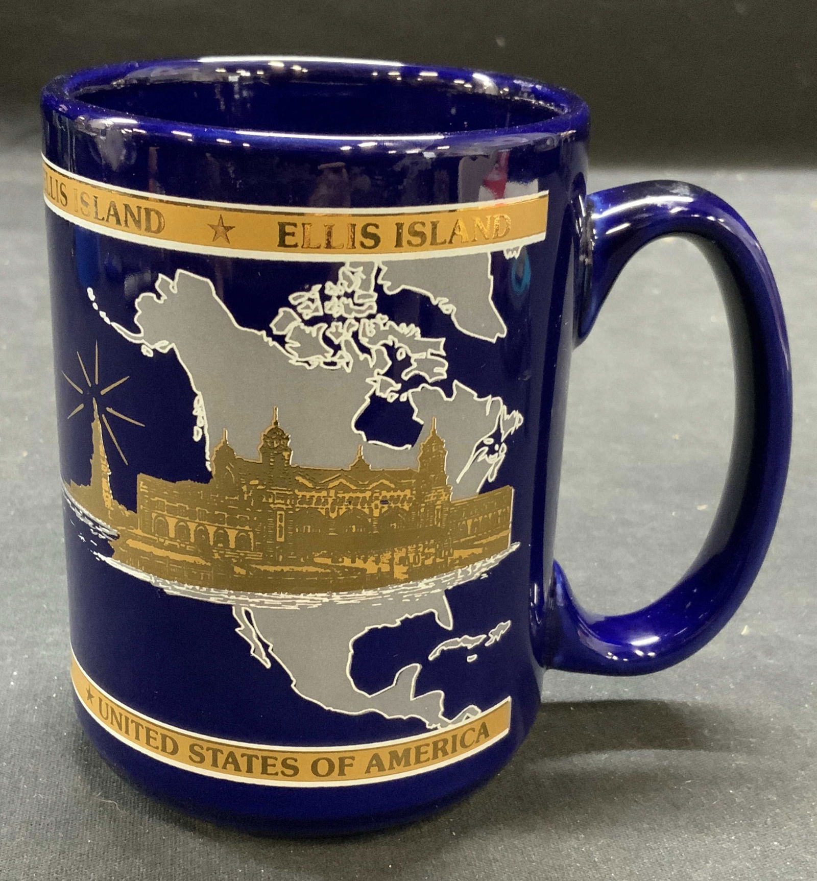 Kapan Kent Co 22k Gilt Ellis Island Mug Auction