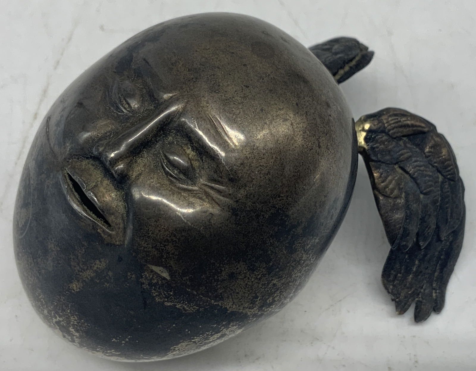 Folk Art Metal Winged Egg W Face Sculpture Auction