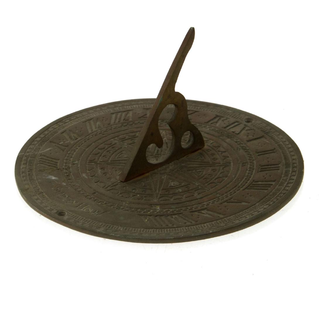 Old armillary sundial with Atlas holding sphere - early