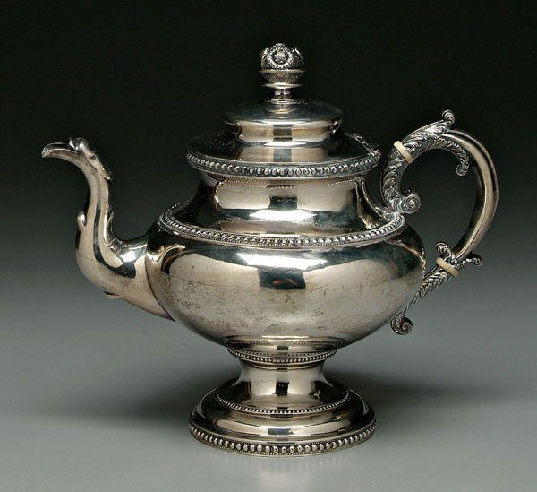1071: Coin silver teapot,