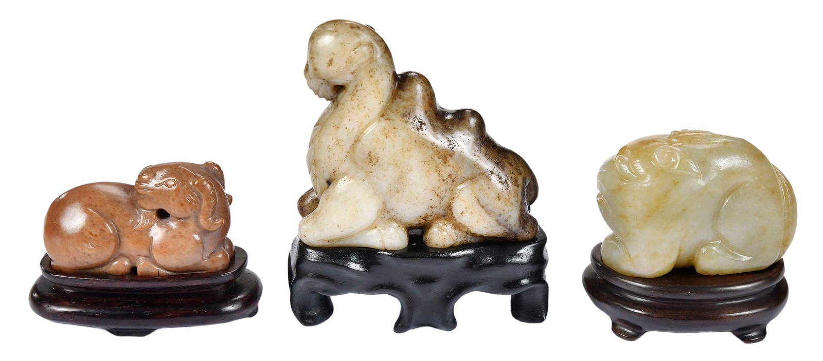 Three Carved Jade Animals With Stands Auction