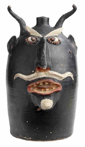 Monumental Browns Pottery Devil Jug