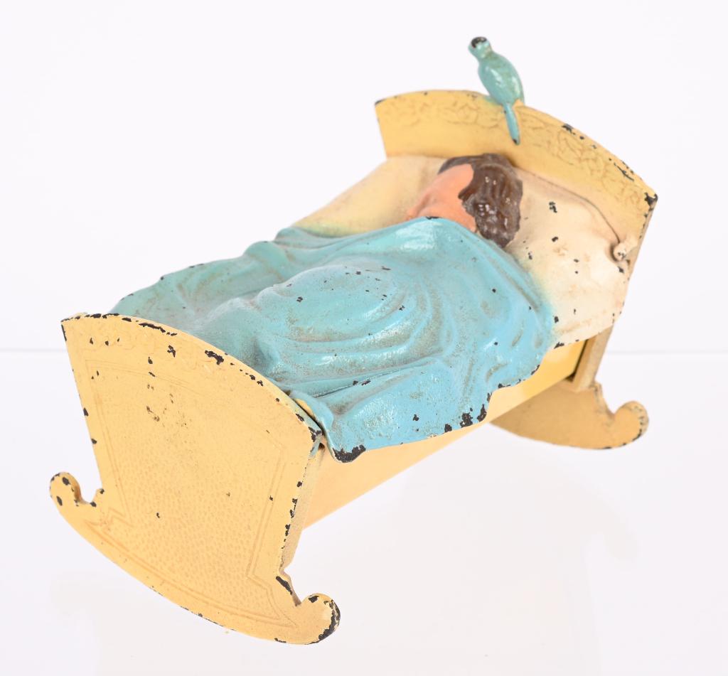 Cast Iron Baby In Cradel Still Bank