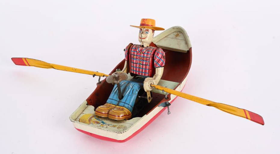 Japan Tin Windup Man In Rowboat