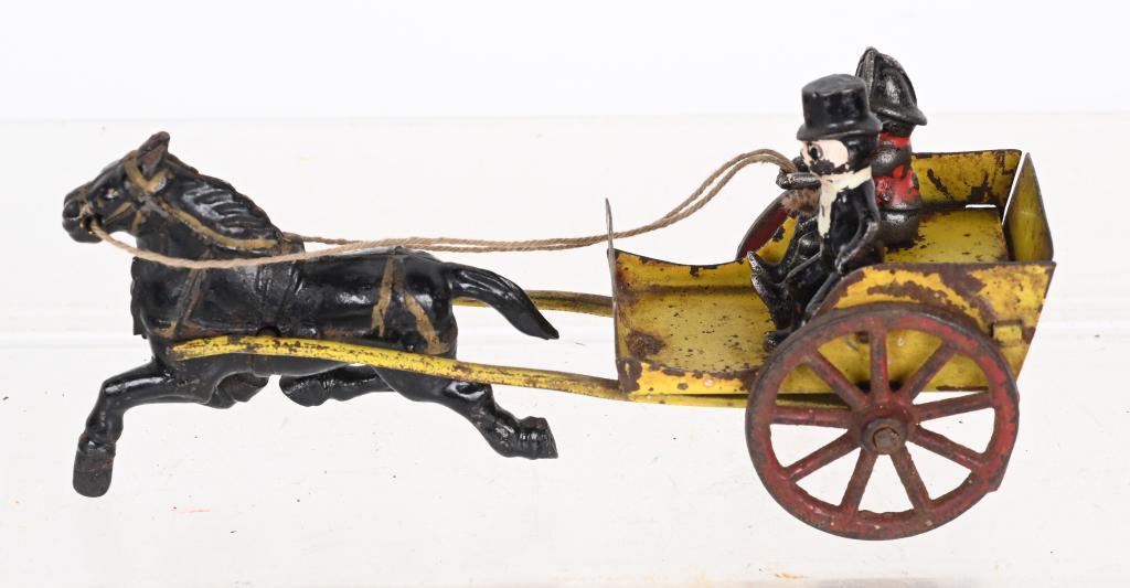 Wilkins Cast Iron & Tin 2 Figure Brownie Cart Auction