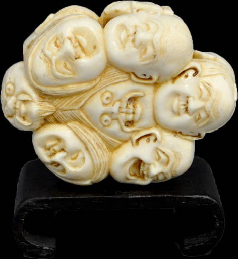 Meiji Period Ivory 7 Faces Netsuke