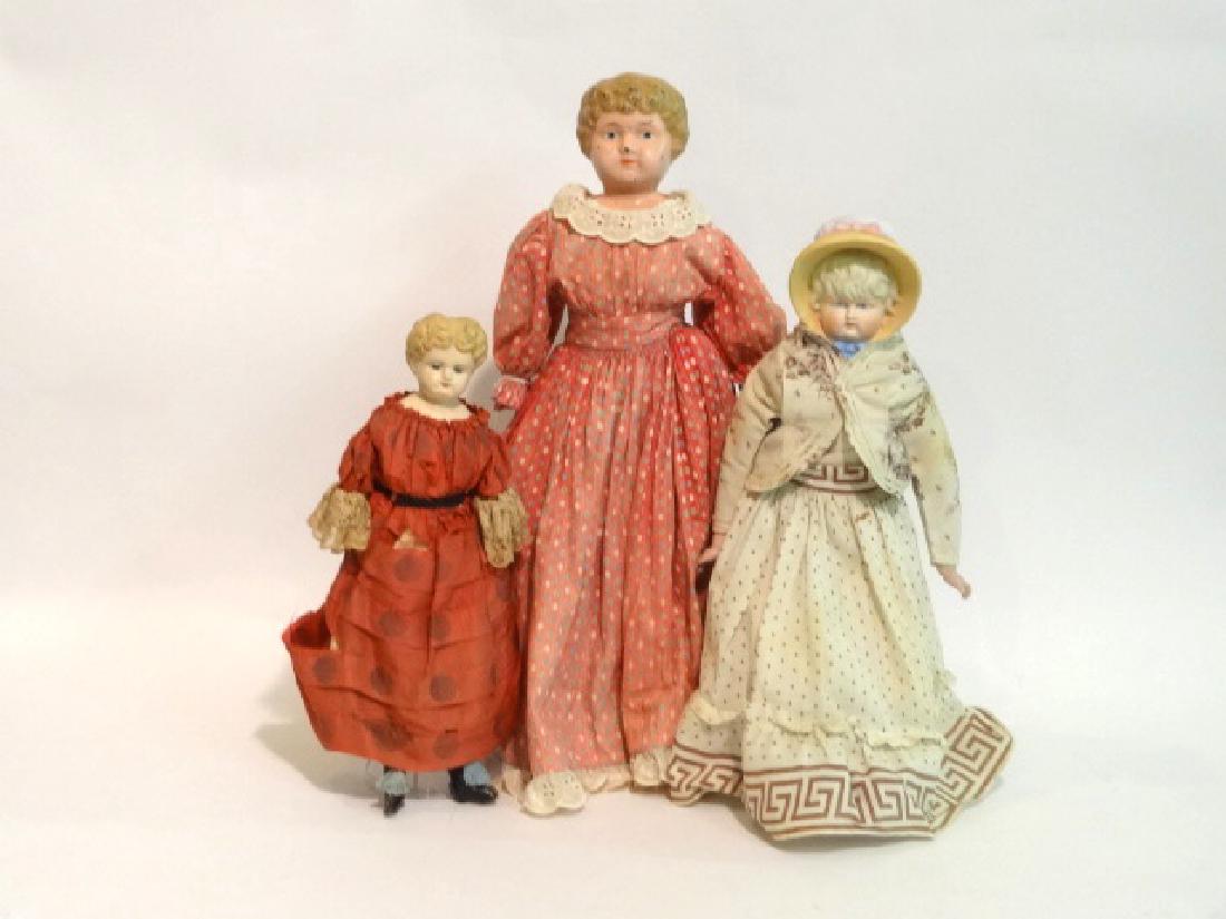 Three Early Dolls