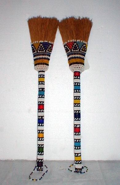48: Pair multicolored, brightly beaded, African Whisk