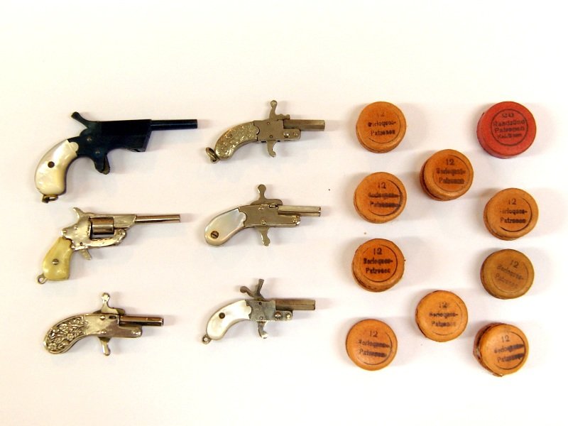 Six Miniature Firing Cap Guns