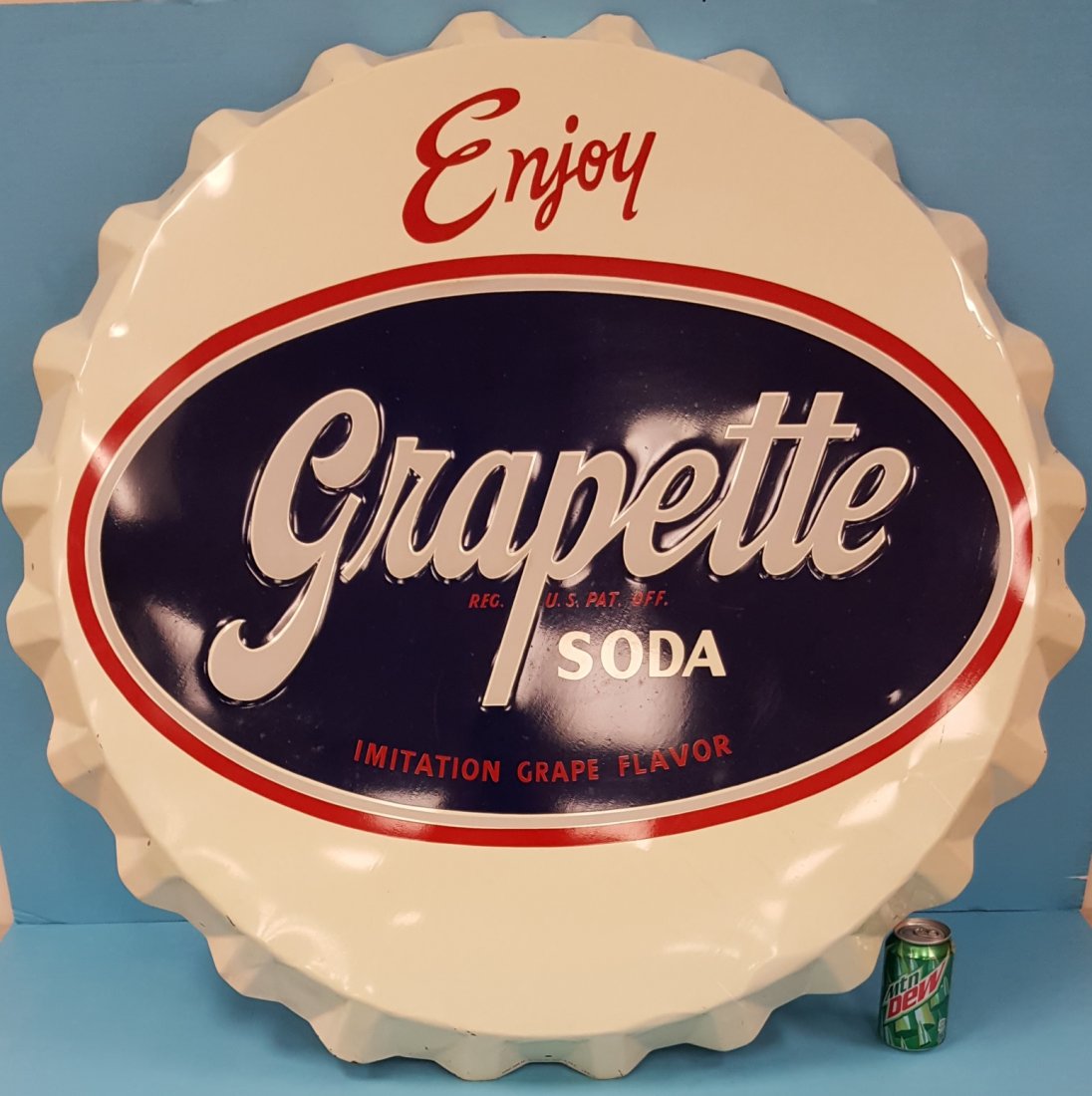 Grapette Embossed Bottle Cap Sign