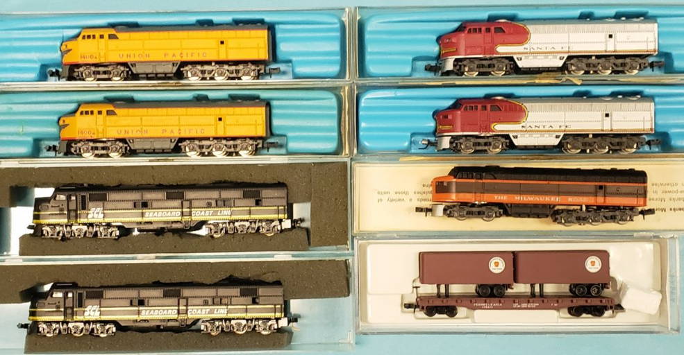 Lot Of 7 Atlas N Scale Locomotives & Piggyback Flat