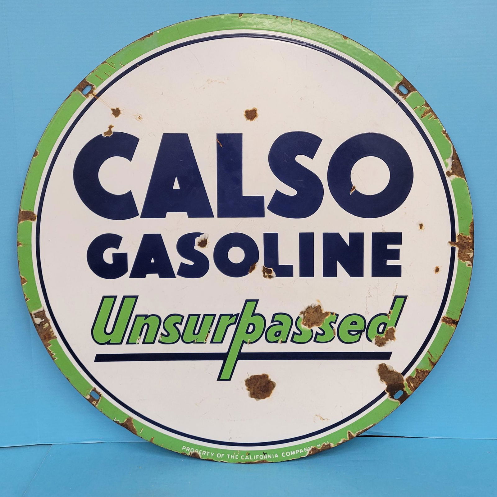 Calso Gasoline Unsurpassed 30" Porcelain Sign
