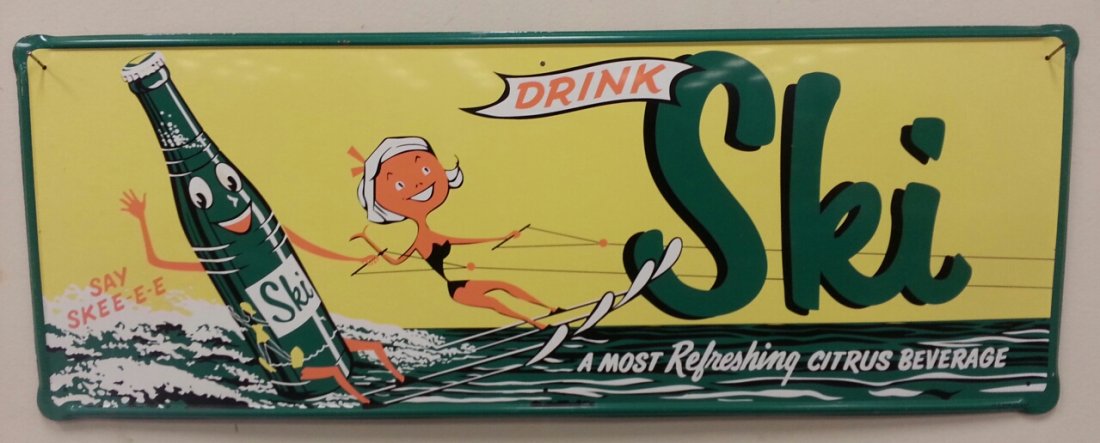 Ski soda pop advertising sign