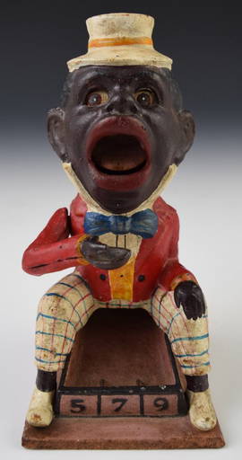 J.e. Stevens Cast Iron Black Americana Amusement Toy.
