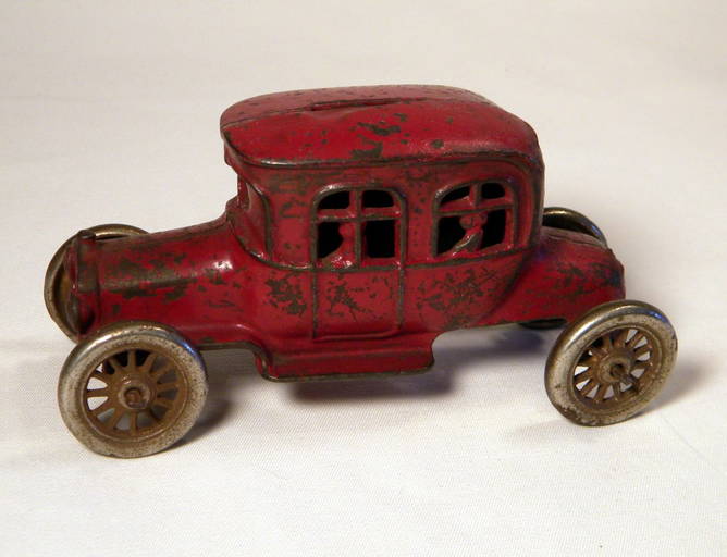 Cast Iron Auto With Passengers Still Bank