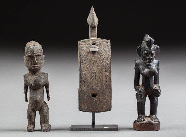 Lot With Two Statues And Lock Element