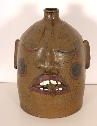 Tom Touchstone. Face Jug With Cigar.