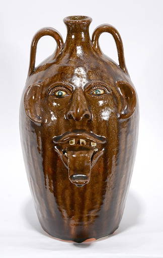 Joe Reinhardt. Face Jug With Tongue Sticking Out.