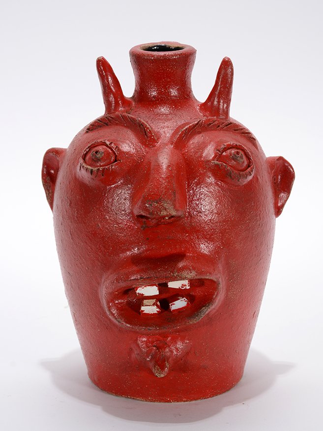 Brown Brothers. Small Early Red Devil Face Jug.