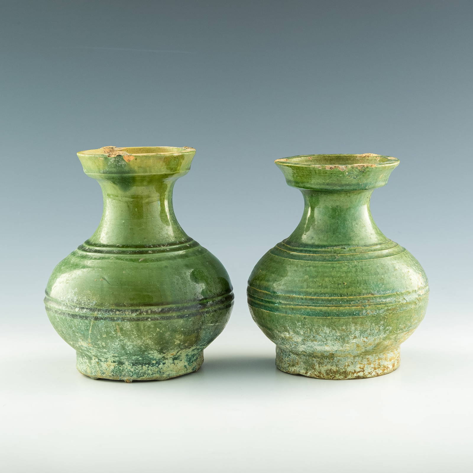 Two Chinese Green-glazed Vases, Han Dynasty Auction