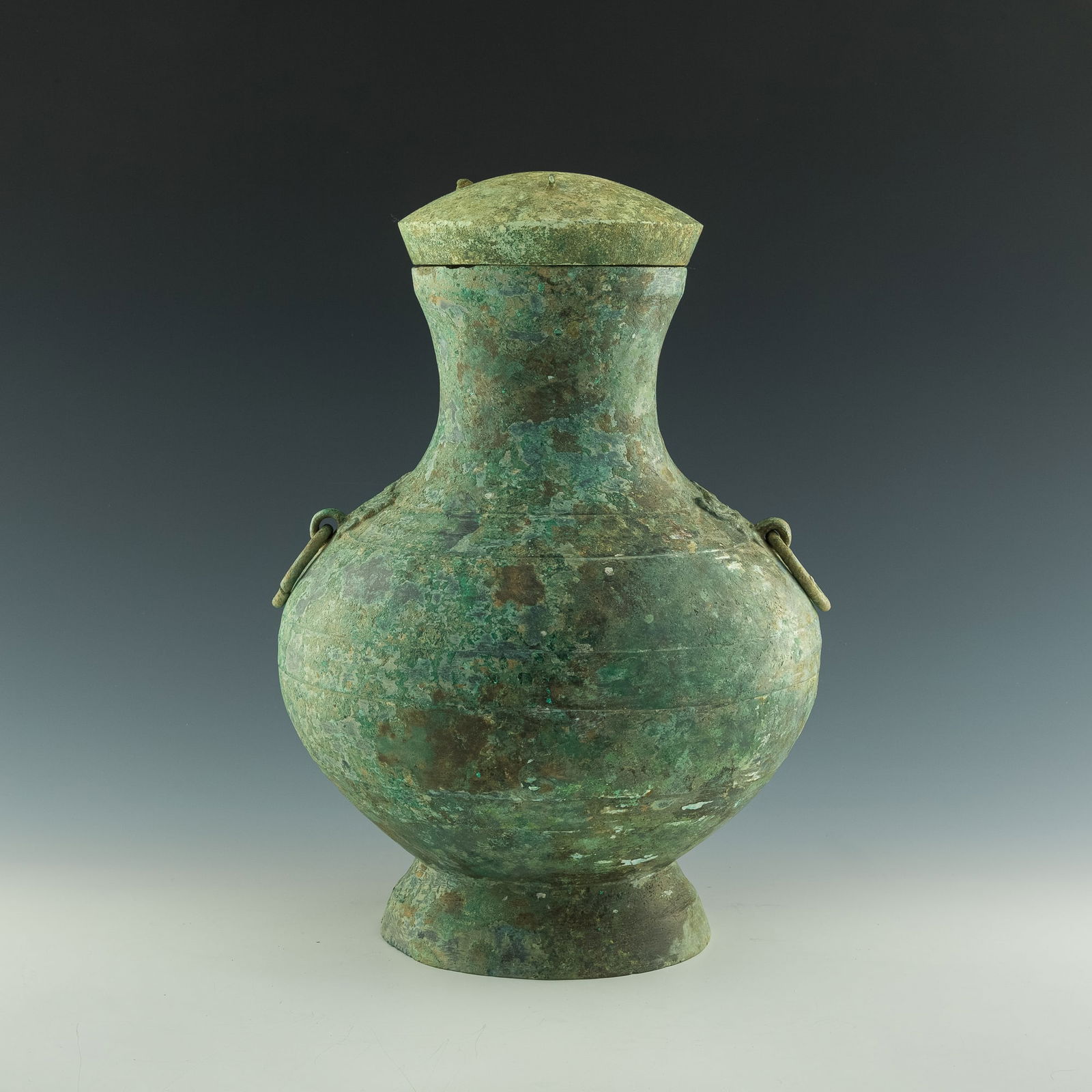A Chinese Bronze Hu Vase With Beast Handles, Han Dynasty Auction