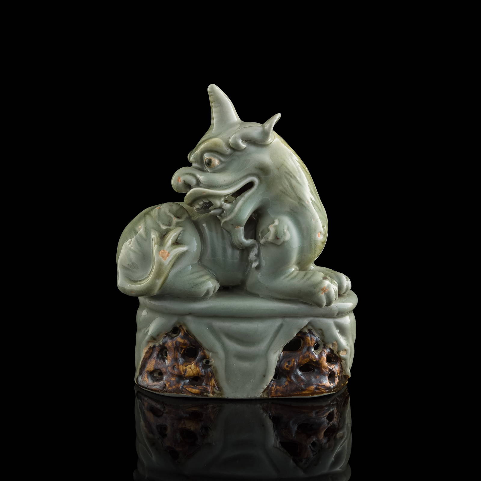 A Chinese Carved Celadon Luduan Figure, 19th Century Auction