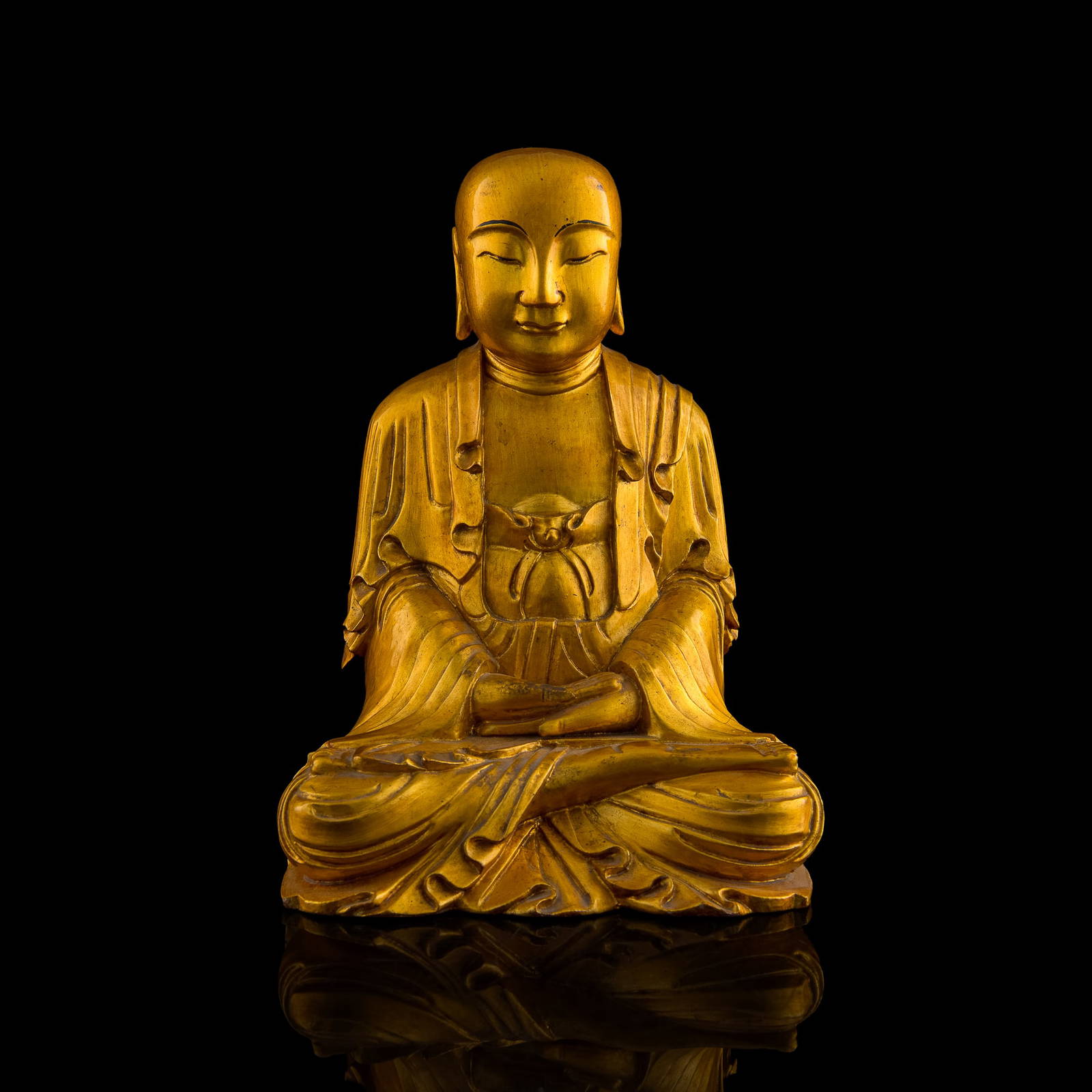 A Chinese Carved Gilt-wood Luohan Statue, 18th Century Auction