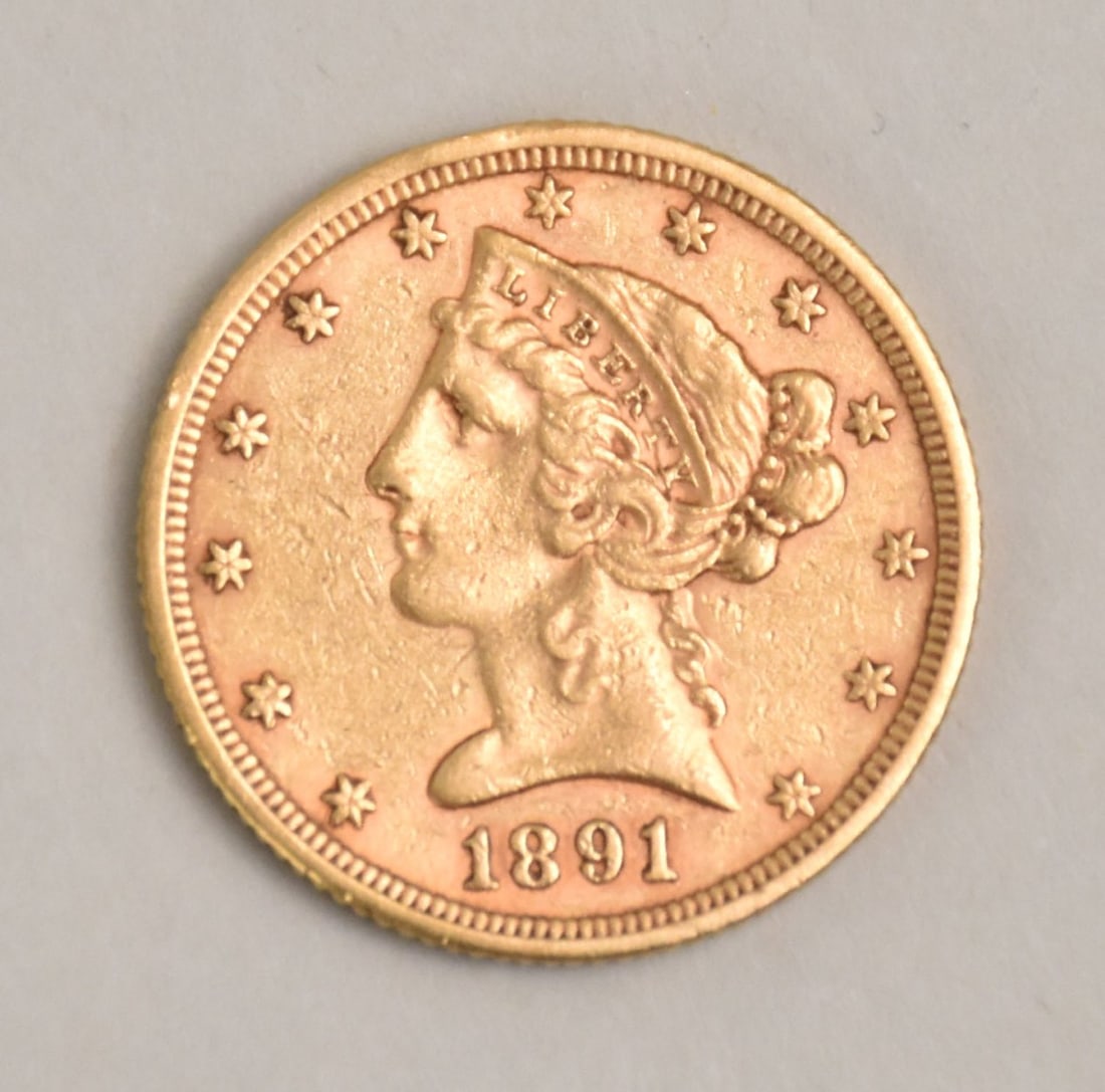 1891 Five Dollar Gold Coin. Wt 8.34 Grams Diameter: 21.65 Millimeters Auction