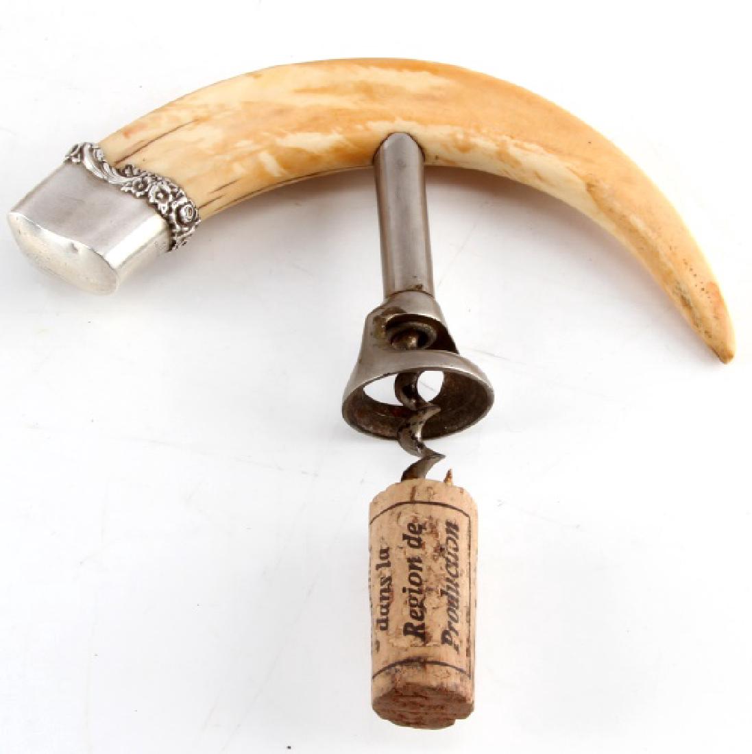 ANTIQUE BOAR TUSK & STERLING CORKSCREW