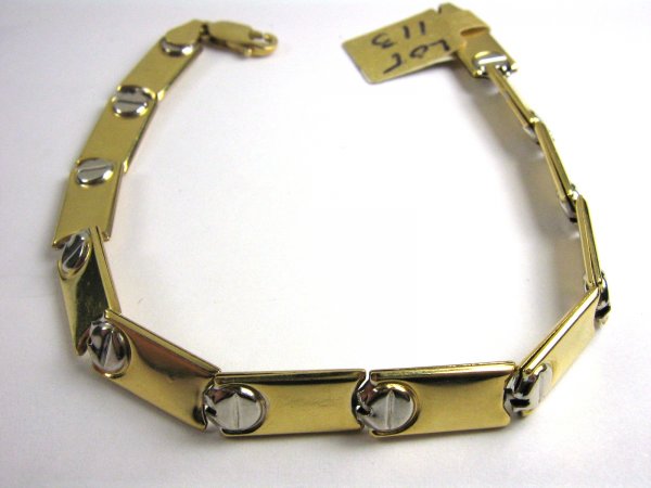 7" CARTIER STYLE BRACELET. 14K GOLD SCREW DESIGN