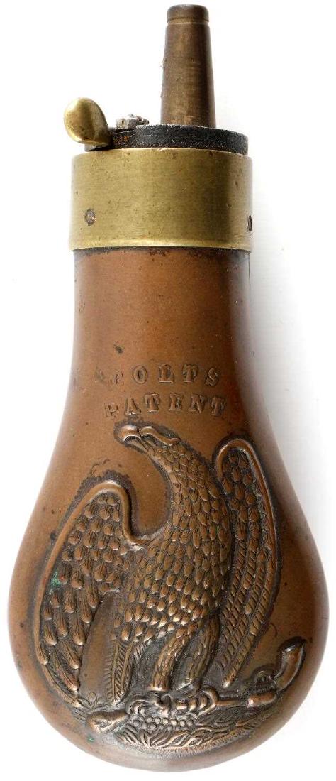 ANTIQUE EMBOSSED COLT EAGLE REVOLVER POWDER FLASK