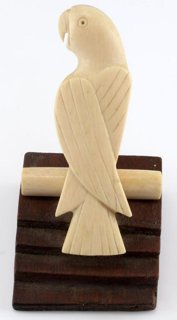 ANTIQUE IVORY PARROT ON A PERCH FIGURINW | Barnebys