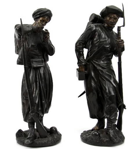A Pair Of French Colonial Statues