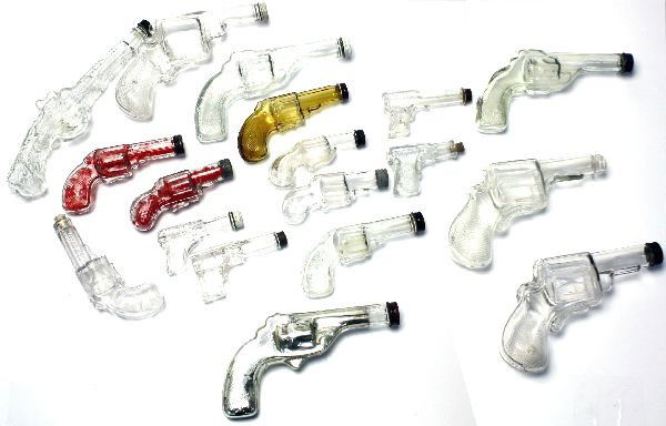 19 ANTIQUE GUN GLASS CANDY CONTAINERS